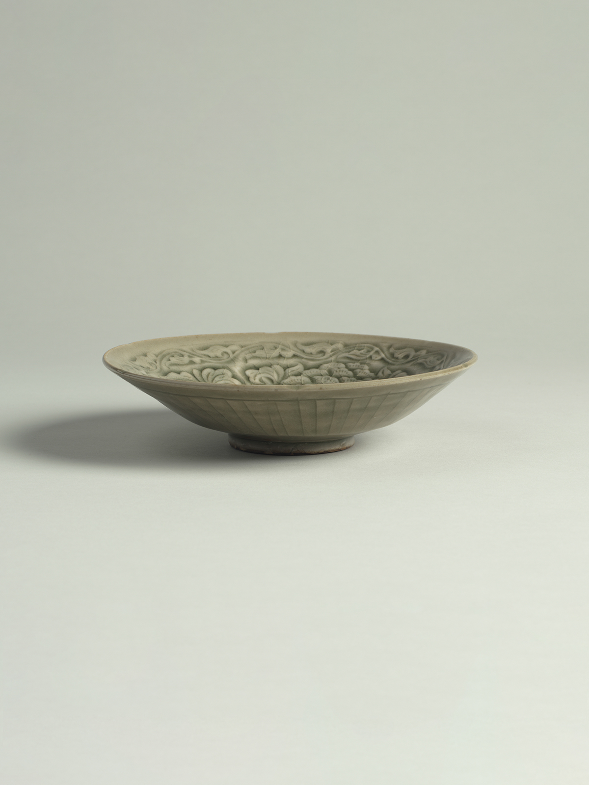 4. Green-glazed stoneware dish | objects | Eskenazi Exhibition